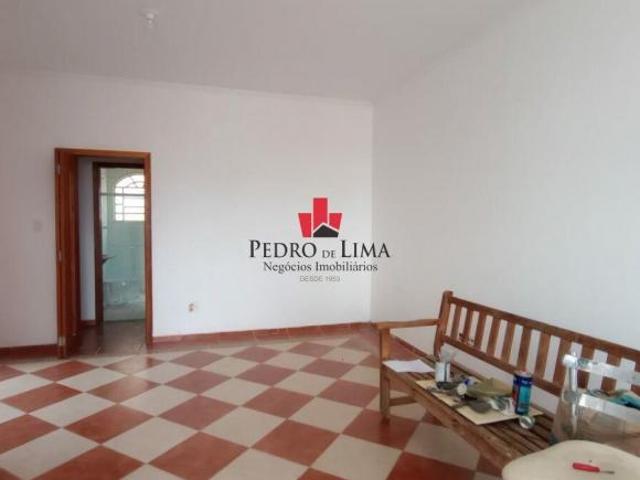 Terreno com três residências na Vila Ré