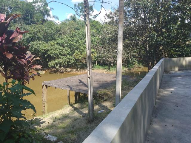 TERRENO – Com uma casa construída