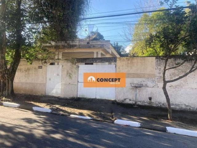TERRENO COM UMA CASA E EDÍCULA na Rua Cândida Miranda, próximo ao Centro de Poá