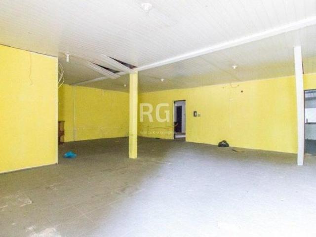 TERRENO COM UMA CASA, NO BAIRRO PASSO D` AREIA
