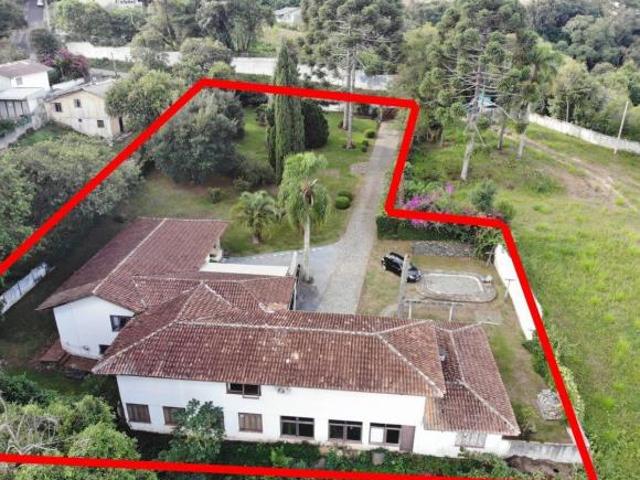 Terreno com casa não averbada a venda no Vista Alegre, ZR2 2.218m² Curitiba