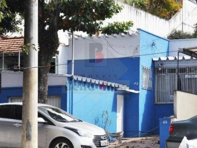 Terreno com casa antiga