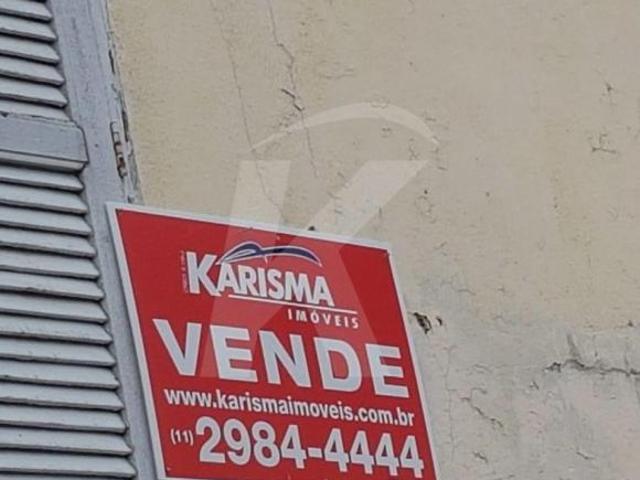 Terreno com casa antiga
