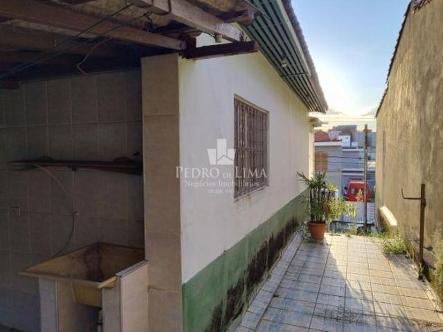 Terreno com casa antiga