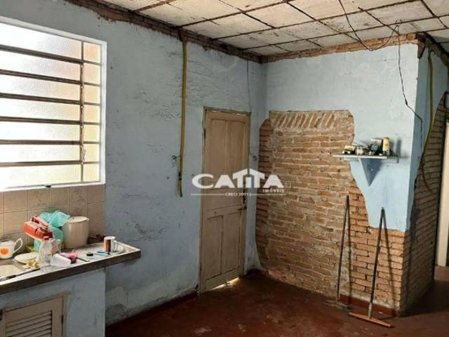 Terreno com casa antiga