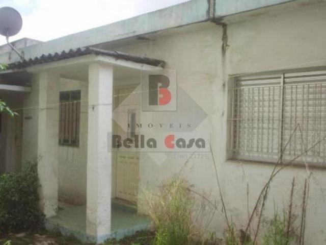 Terreno com casa antigas