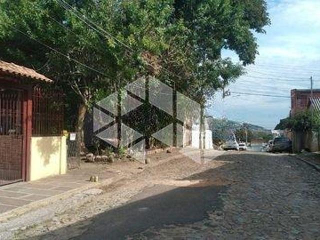 Terreno com casa de aivenaria