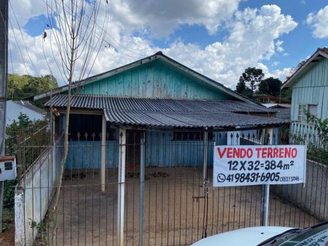 terreno com casa de 4 peças de material ao lado do Hospital Veterinário de Curitiba