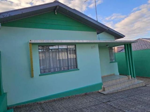 Terreno com casa em alvenaria