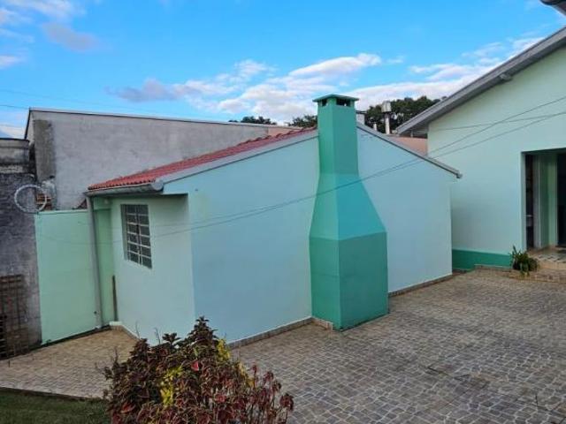 Terreno com casa em alvenaria