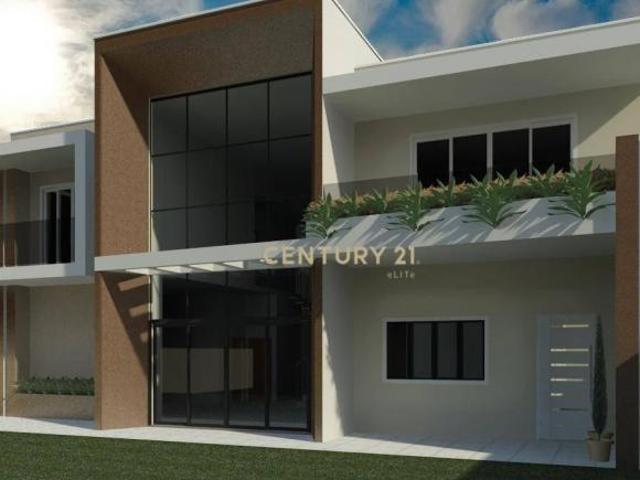 Terreno com casa em construção,com estrutura pra sobrado
