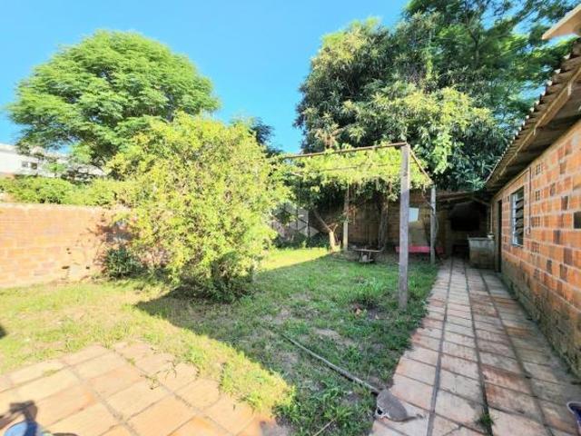 TERRENO COM CASA PRÓXIMO AO SUPERMERCADO BELTRAME