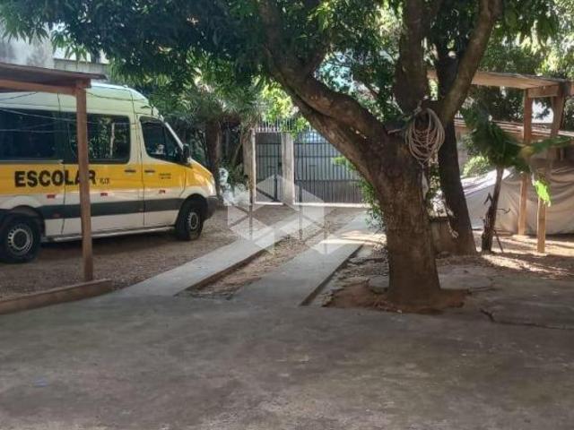 Terreno com casa