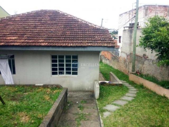 Terreno com Casas à venda por R$ 650.000 Santa Cândida Curitiba/PR