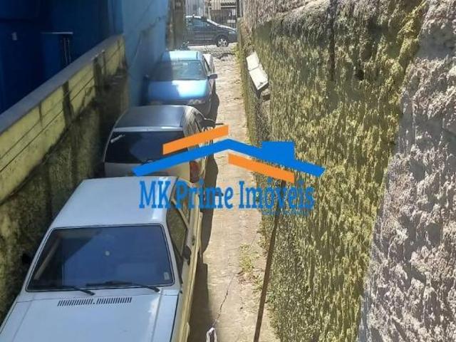 Terreno com casas antigas na Avenida Dom Pedro Primeiro Vila Osasco