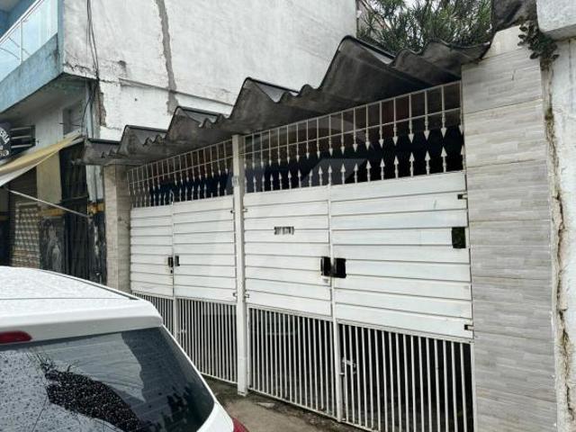 Terreno com casas antigas no Jardim Brasil