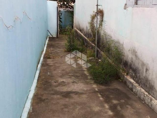 Terreno com casas antigas 360 m² Piraporinha