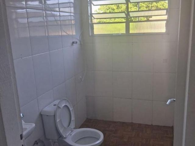 TERRENO COM CASAS GEMINADAS / JD. ALPINO