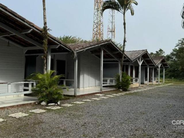 Terreno com Chalés à Venda na Praia do Camburi – Excelente Oportunidade