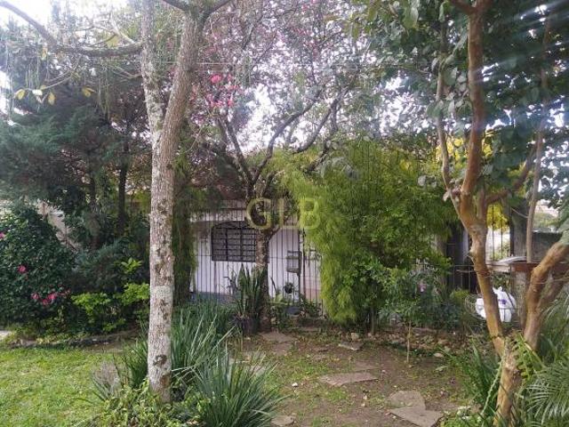 Terreno com construção no Bairro Alto