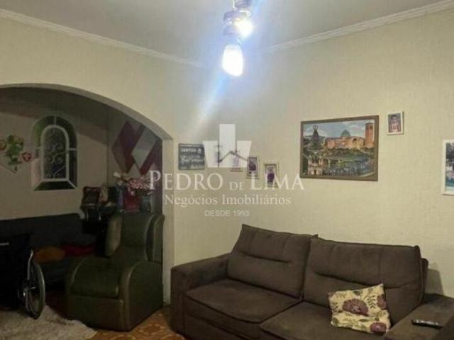 Terreno com duas casas na Penha