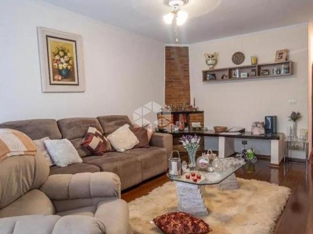 Terreno com duas casas no Jardim Paraiso