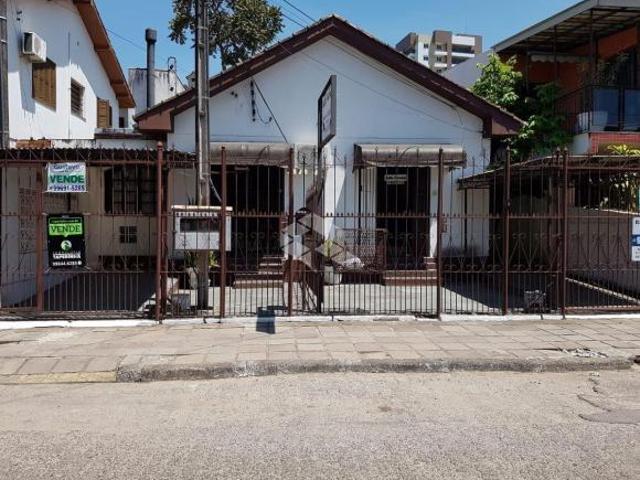 Terreno com duas casas a venda