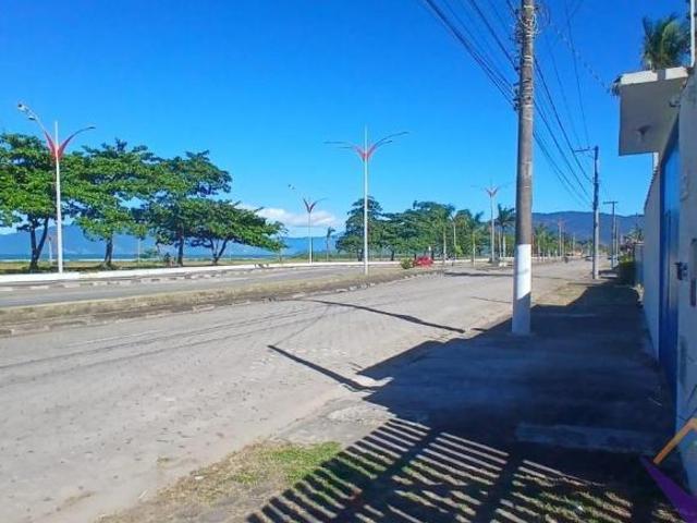 Terreno com duas casas à venda na avenida da praia, Jd Britânia