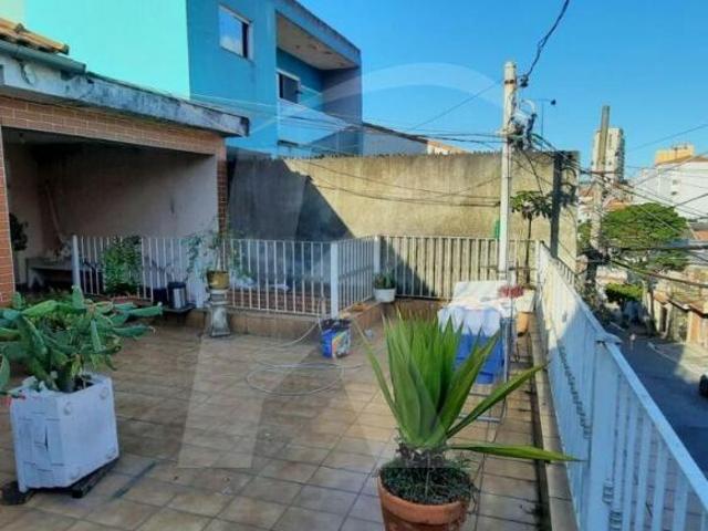 Terreno com duas casas assobradadas