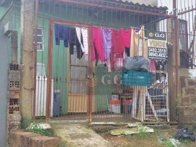 Terreno com Duas Casas Individuais