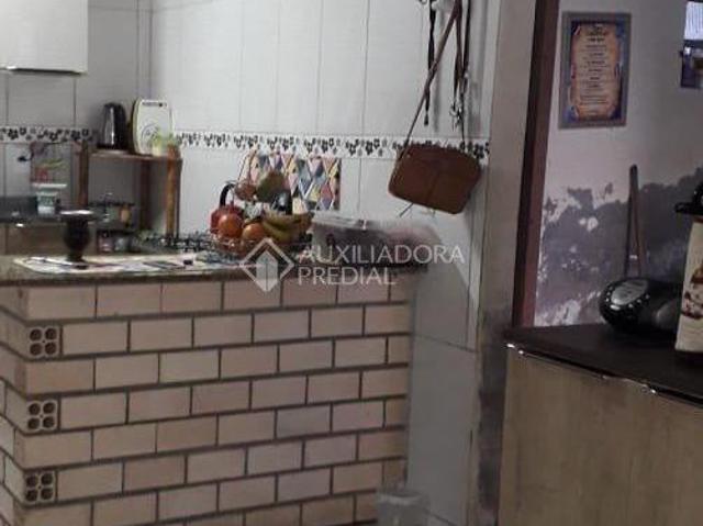 Terreno com duas casas