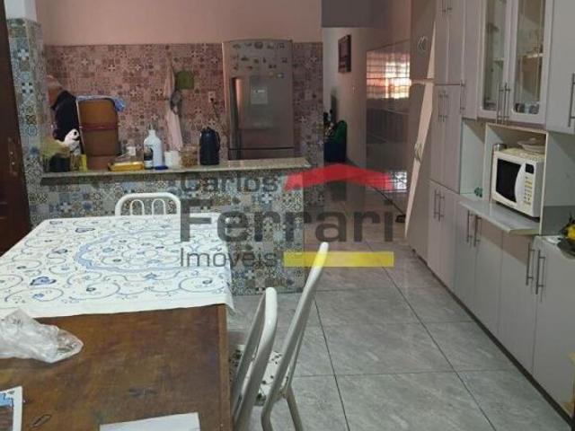 TERRENO COM SOBRADO NO JARDIM MODELO/JAÇANÃ COM 4 DORMITÓRIOS, QUINTAL E 2 VAGAS DE GARAGEM