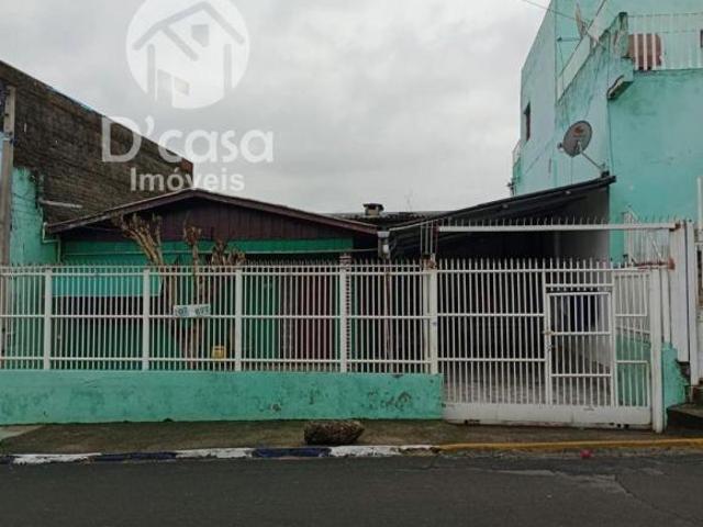 Terreno de esquina com casa e prédio comercial à venda, 714 m² por R$ 585.000 Vila Monte Carlo C
