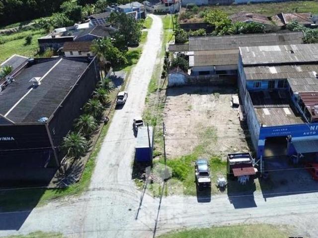 Terreno de esquina na rodovia em Shangri lá