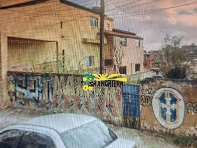 Terreno de 356,80m² c/ 4 casas 7 dormitórios à venda por R$ 430.000
