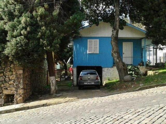 Terreno de 505 m2 com área construída de 300m2 3 casa no Bairro Planalto em Caxias do Sul