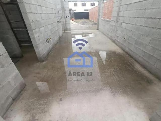 Terreno de 640m² no bairro Jardim Porto Novo em Caraguatatuba, SP 112m², a poucos metros da praia