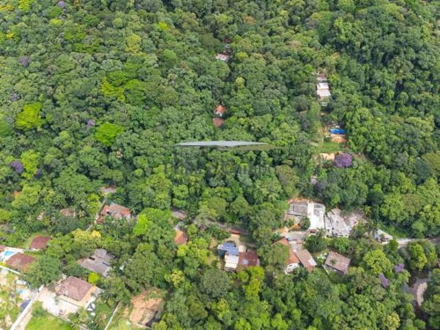Terreno Exclusivo em Boiçucanga com Nascente Natural e Ampla Área Verde