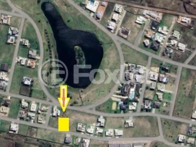 Terreno em Condomínio, 600 m², em Atlântida Sul