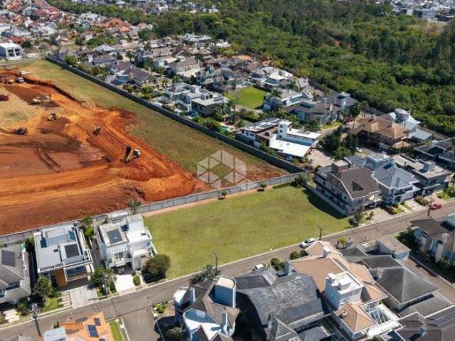 Terreno em condomínio, com 450 m² privativo, bairro Marechal Rondon Canoas