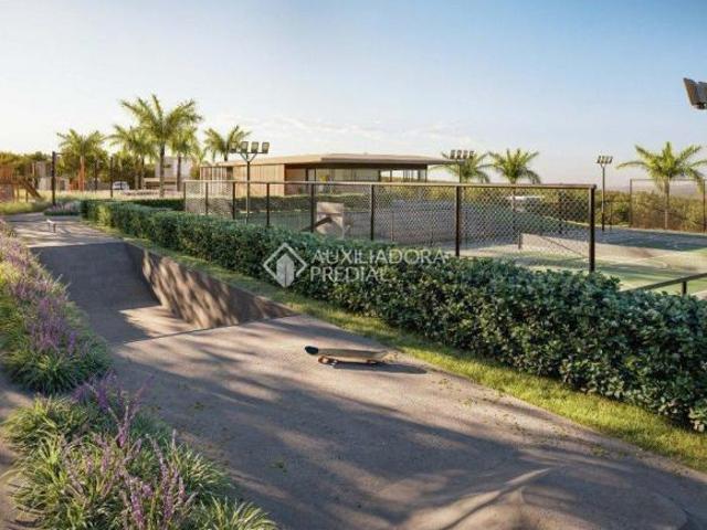 Terreno em condomínio fechado com infraestrutura de clube