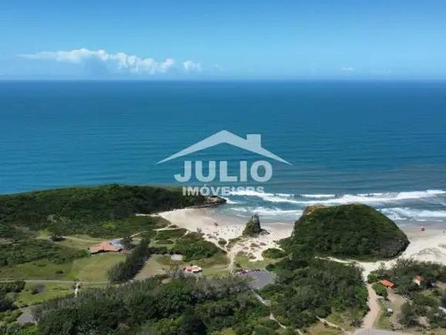 Terreno em Condomínio Fechado no bairro Praia Guarita em Torres