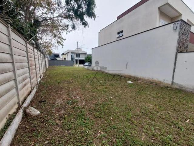 Terreno em Condomínio Jardim Jacinto Condomínio Bosque dos Manacás 256m²