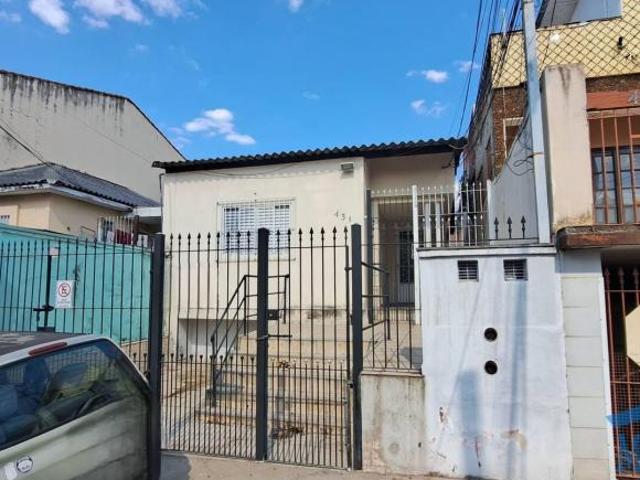 Terreno Jd. das Flores medindo 166 metros com duas casas. Valor: 480.000