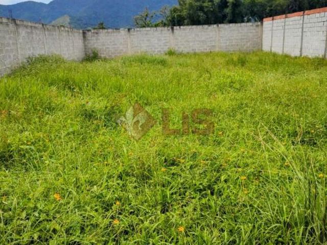 Terreno limpo e murado em condomínio no Portal dos Pássaros