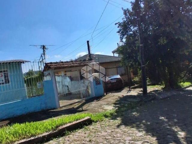 Terreno Partenon com casa