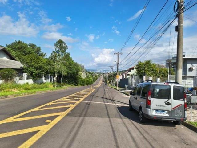 Terreno plano medindo 8,00 x 29,95 parte Alta com vista Rio
