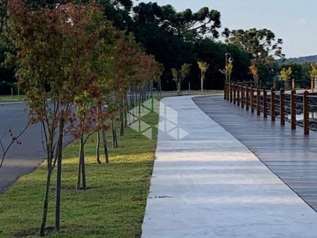 Terreno plano com 1.003,00m² no Condomínio Fechado Laken, em Gramado