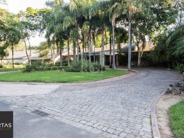 Terreno plano de 1000m² está localizado no conceituado condomínio Terra Ville