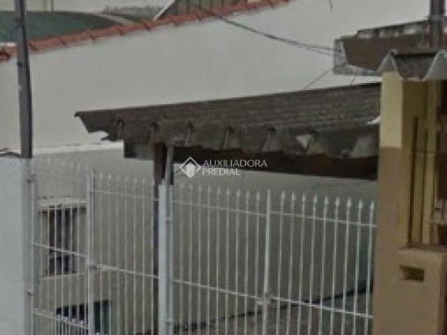 Terreno Residencial / Comercial com casa antiga no Parque Capuava, em Santo André